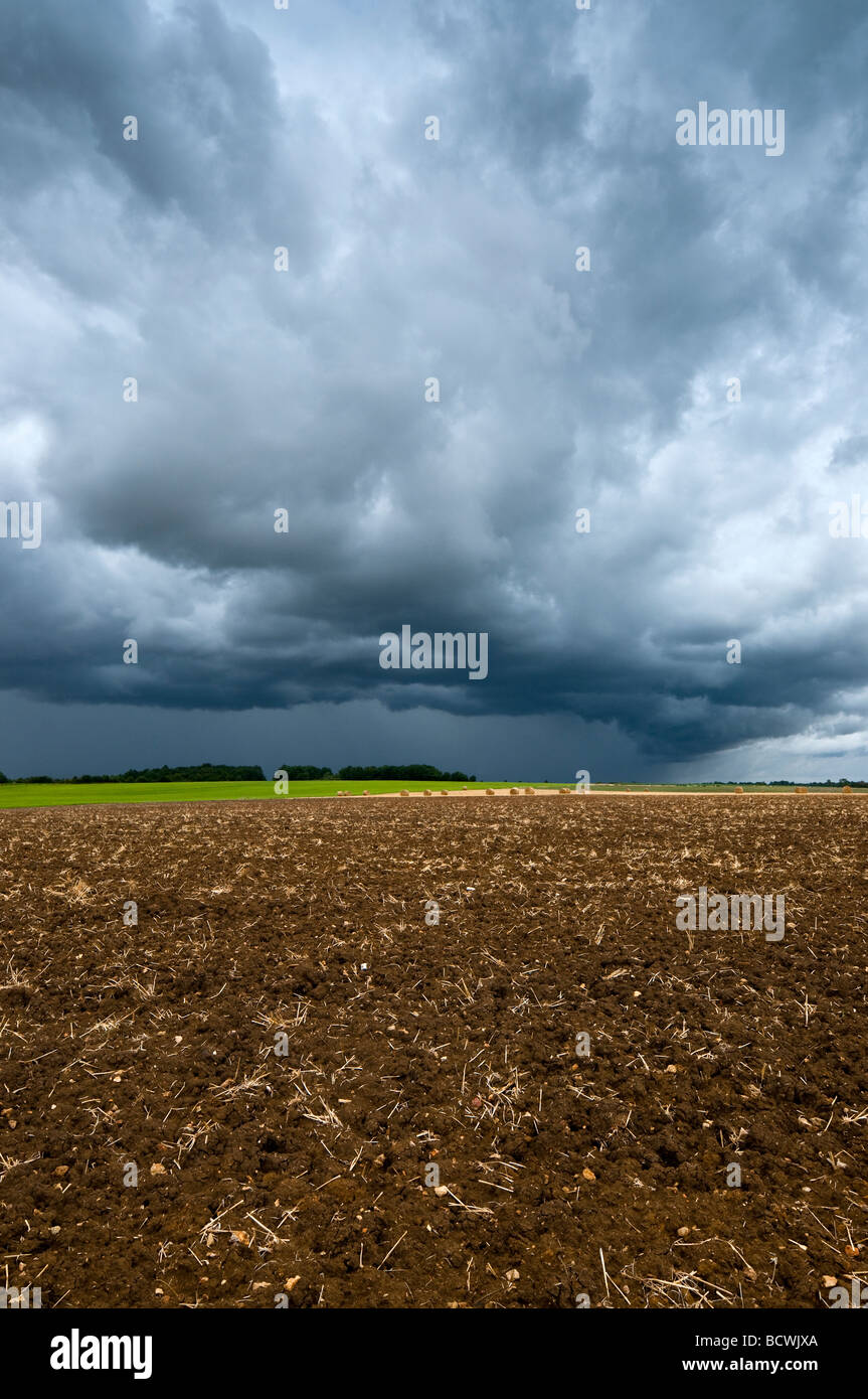 Gathering storm clouds over farmland - sud-Touraine, France Stock Photo ...