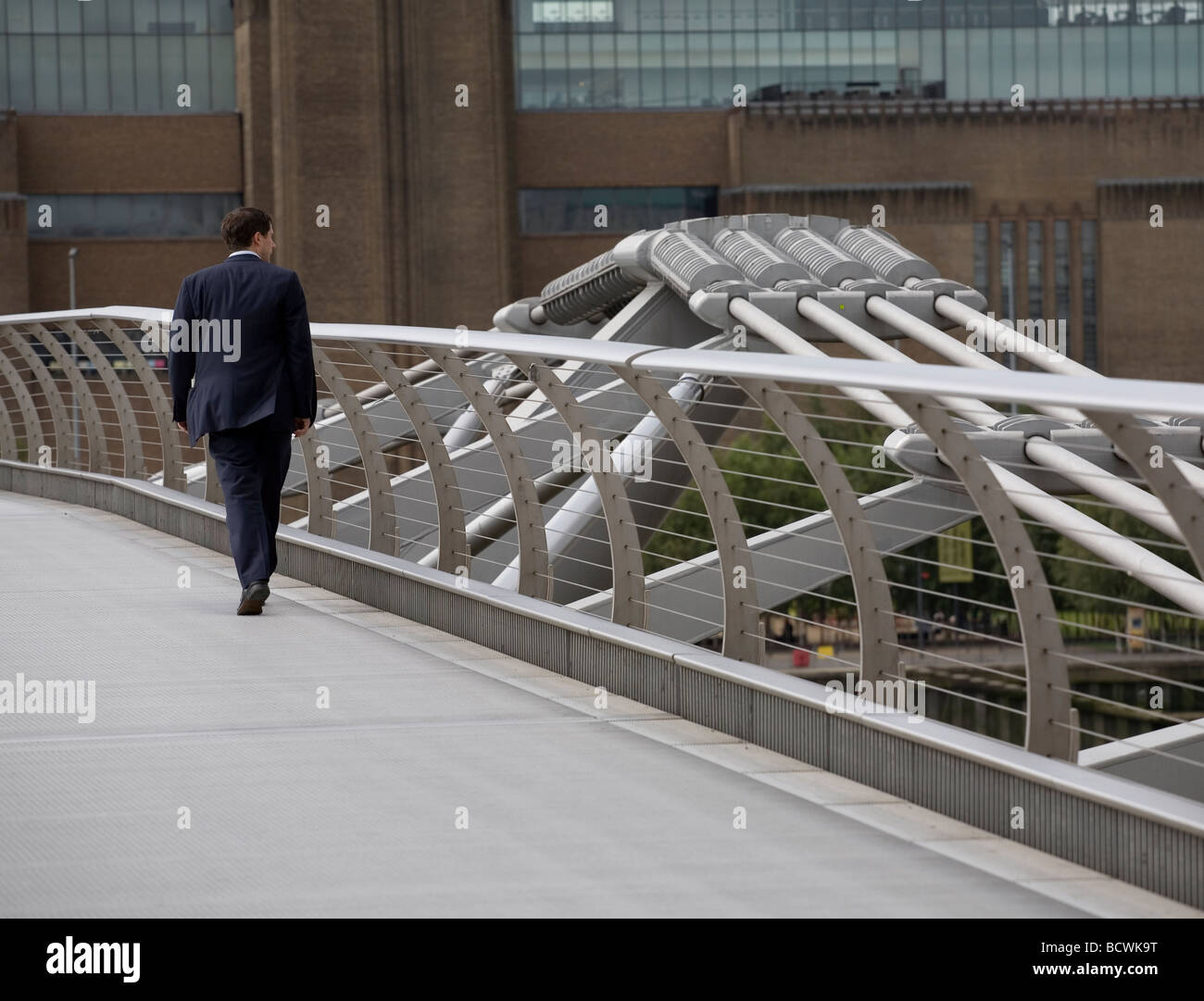 people crossing the Millennium Bridge Stock Photo - Alamy