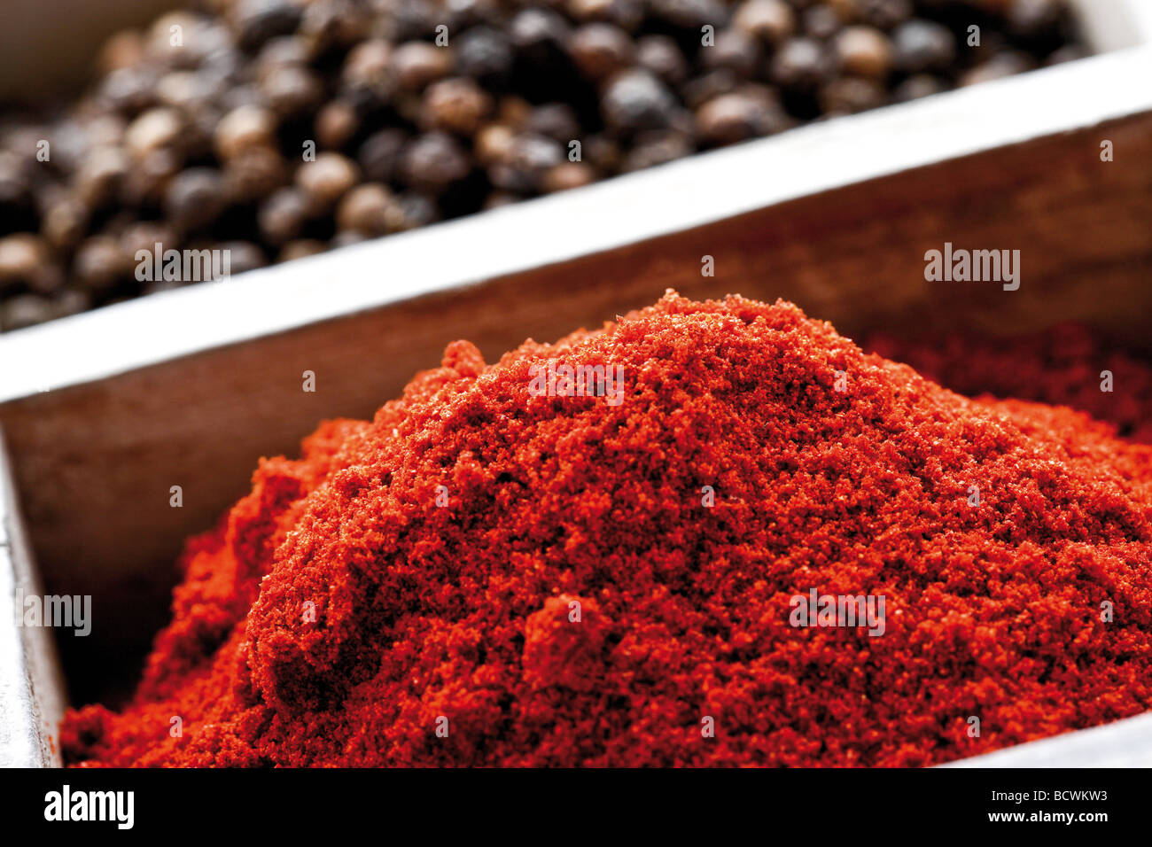 Powdered paprika in a spice box Stock Photo - Alamy