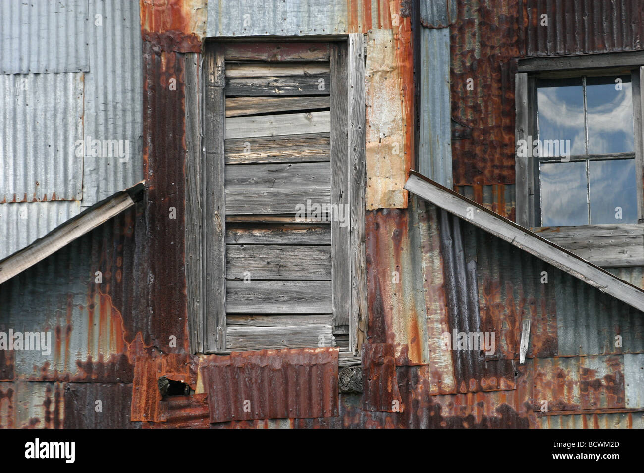 door on old building with rusty corrugated cladding Stock Photo - Alamy