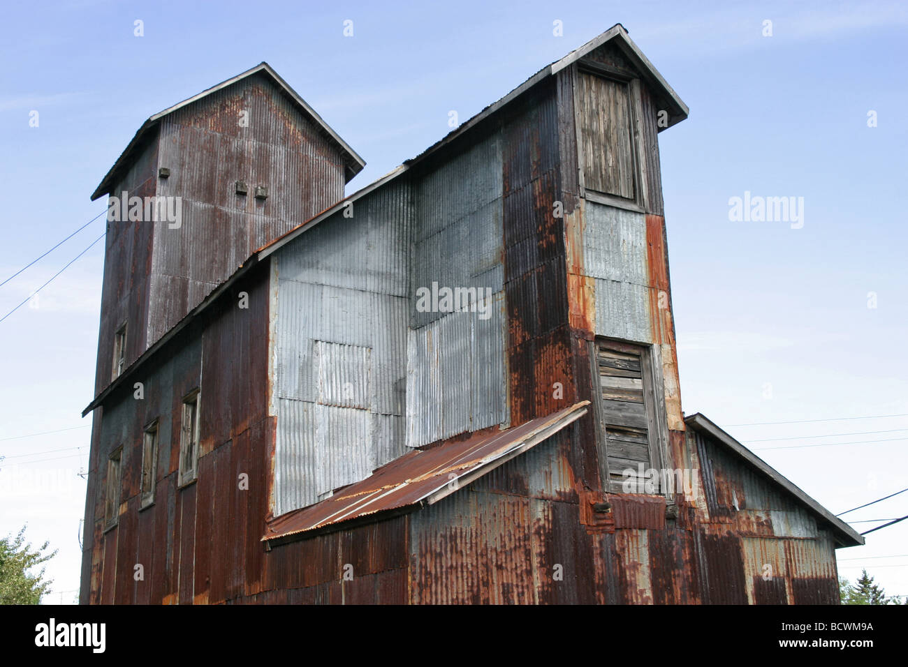 old mining headframe building with rusty corrugated cladding and angled ...
