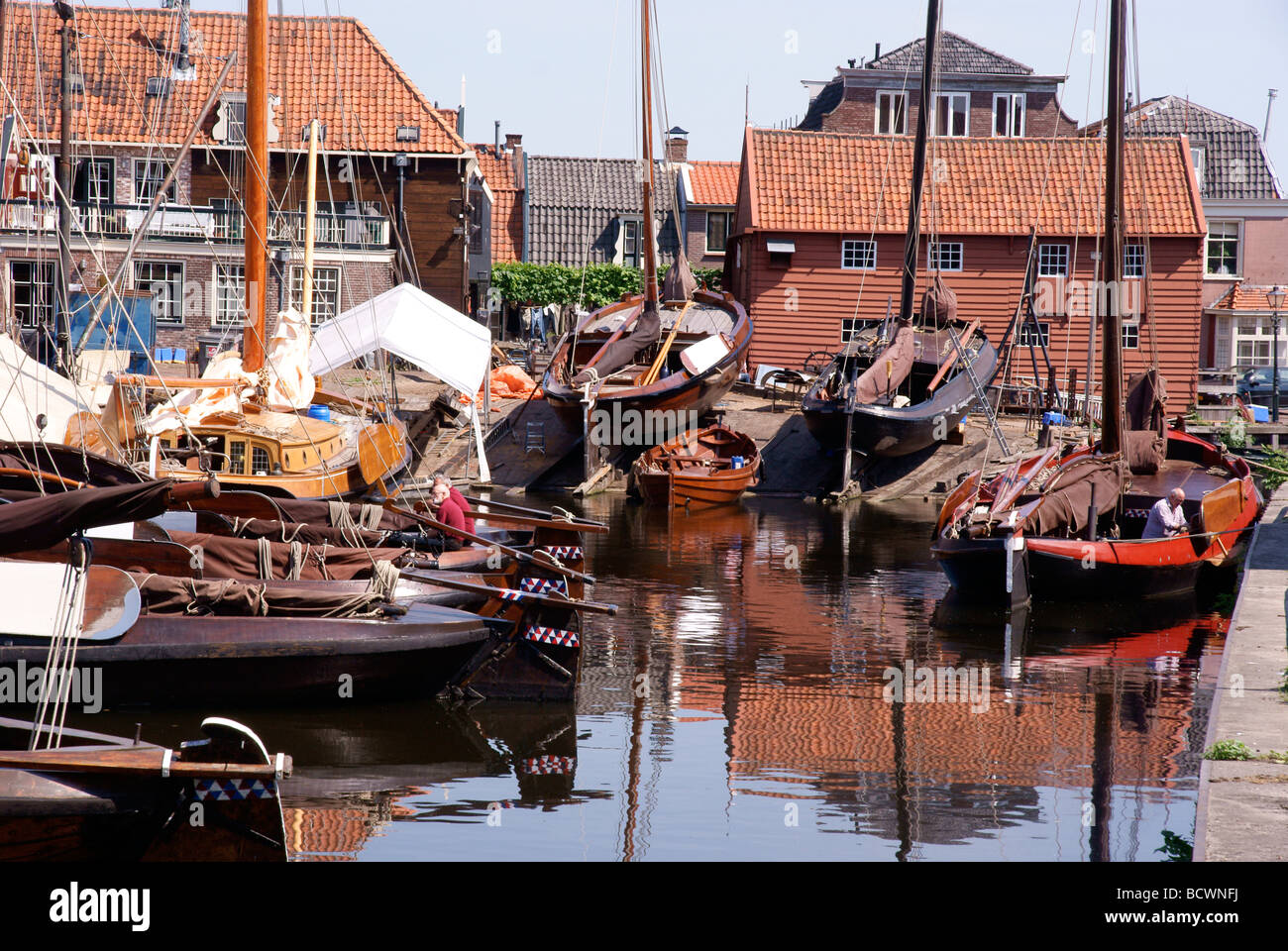 Old dutch sailing boats at the boatyard in Spakenburg Stock Photo - Alamy