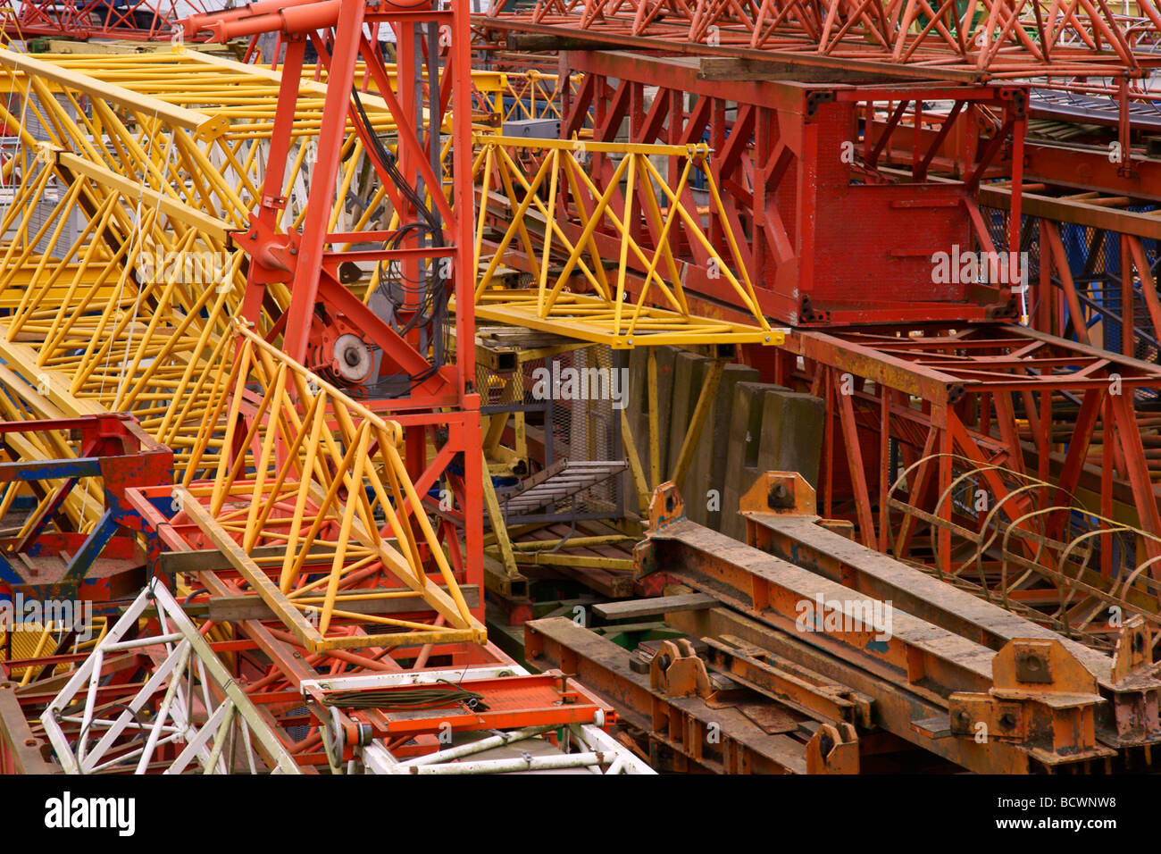 Sections of crane in a crane yard Stock Photo - Alamy