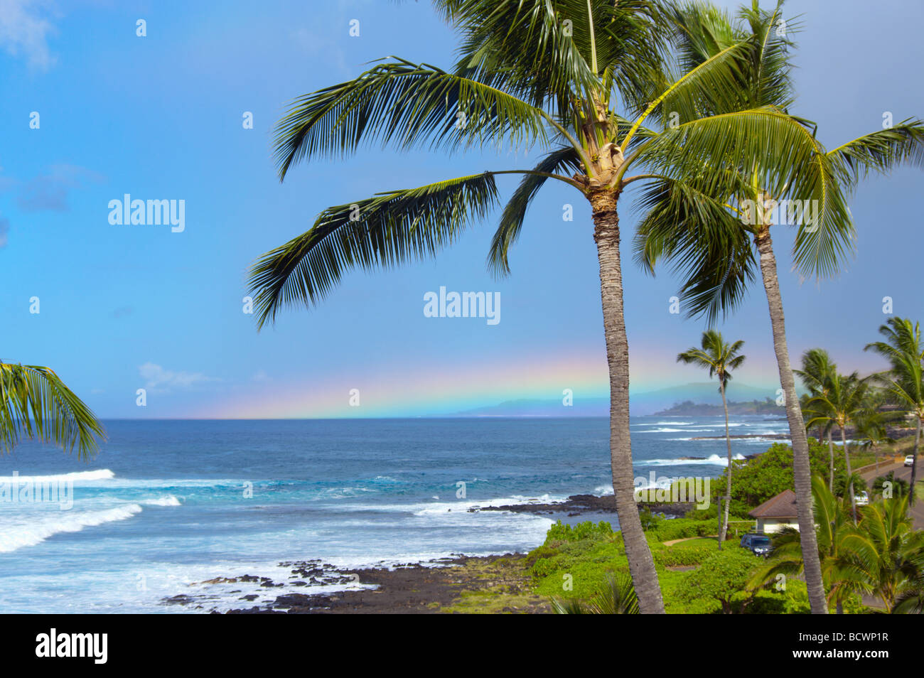 Rainbow Poipu Kauai HI Stock Photo - Alamy