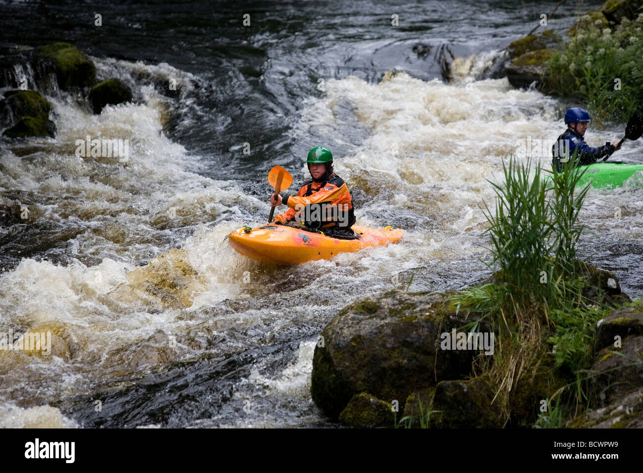Kayaks in Welsh river Stock Photo - Alamy