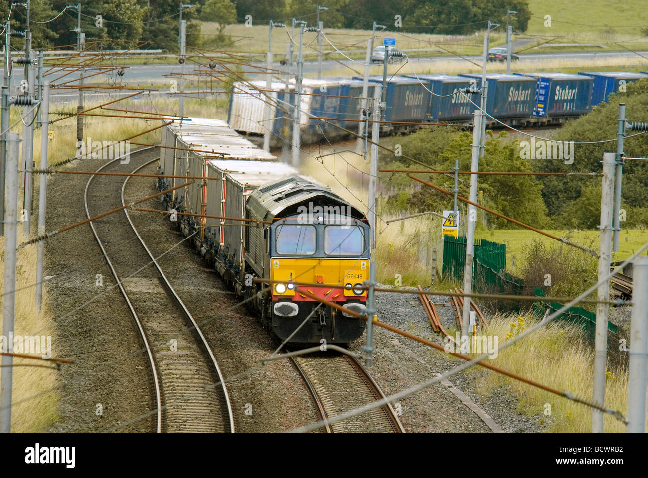 A freight train on the west coast main line at Beck Foot Cumbria Stock ...