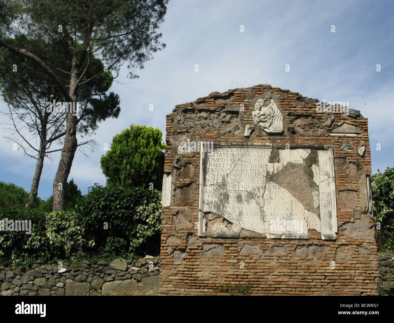 latin inscription on roman tomb on the old appian way in rome italy ...