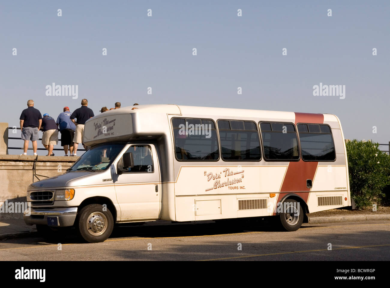 Tourists stepping off a tour bus at The Battery, Charleston, South ...