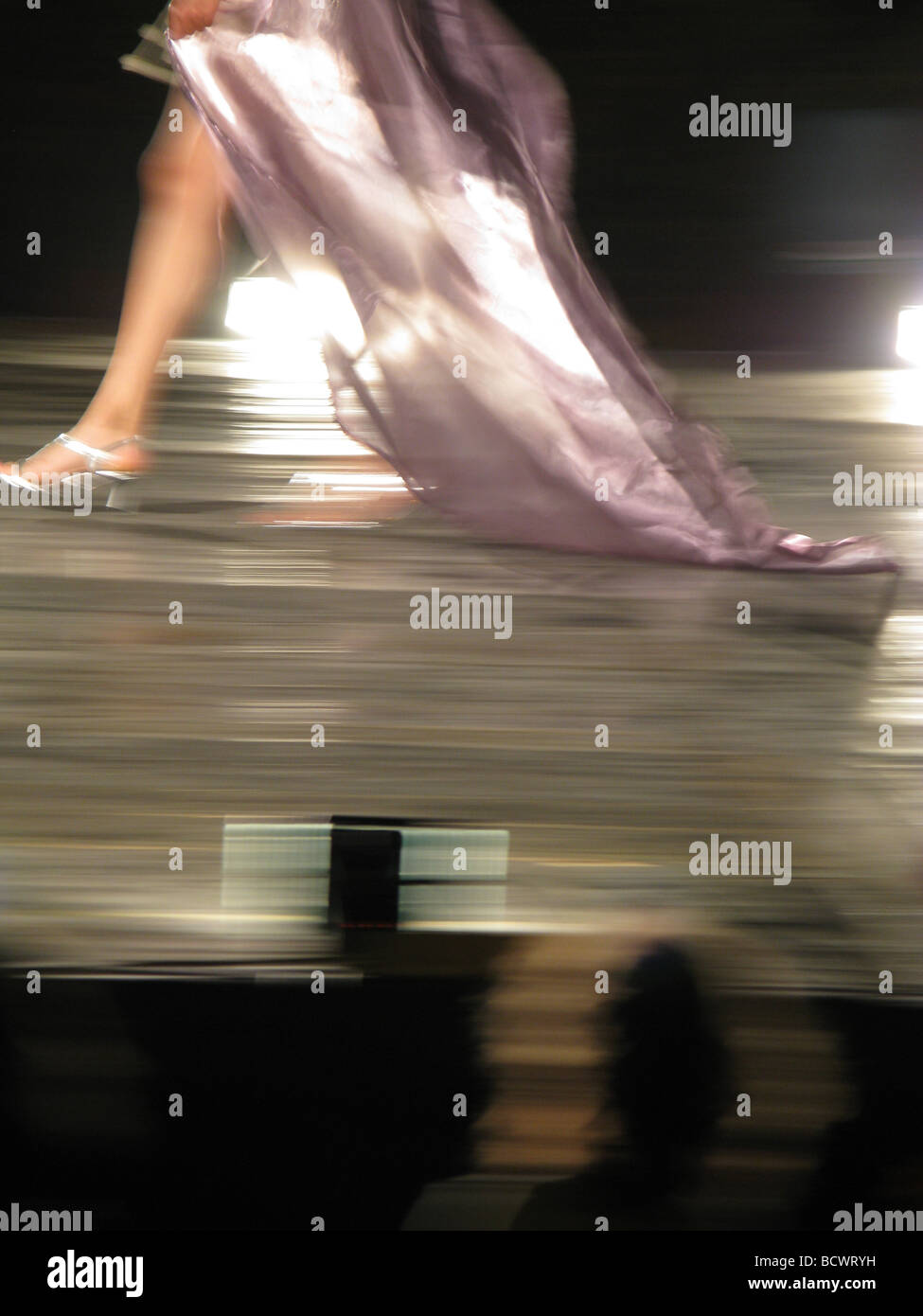 female model on catwalk at fashion show Stock Photo - Alamy