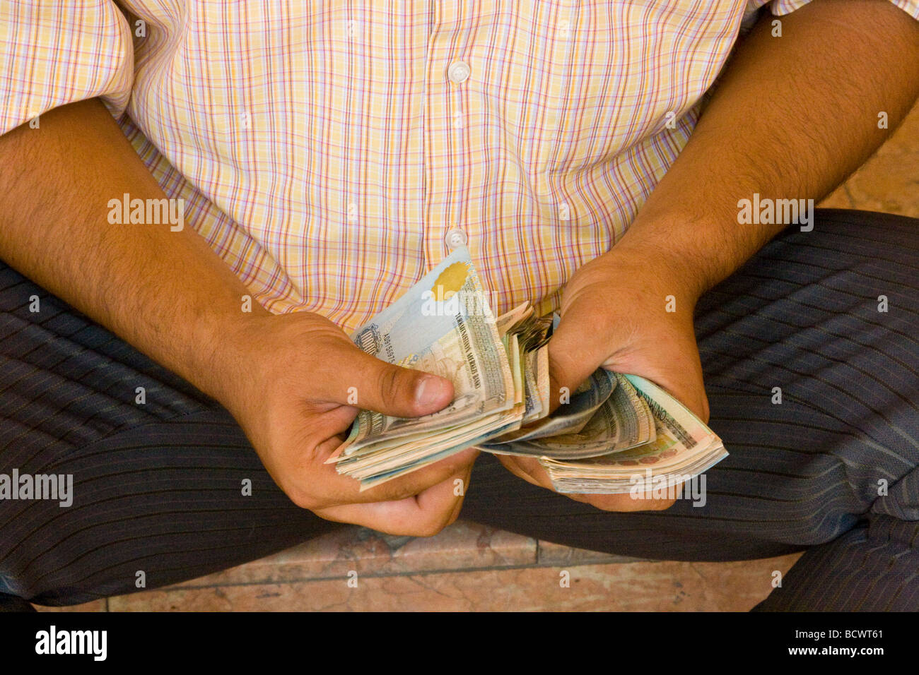 Man Counting Money in Mary Turkmenistan Stock Photo - Alamy