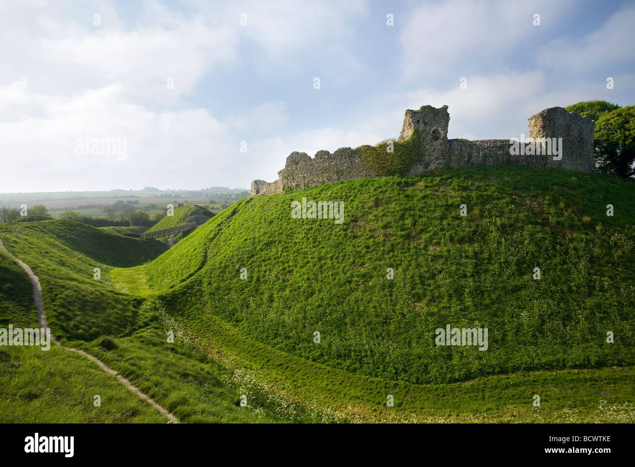 The ruins and earthworks of the Norman motte-and-bailey castle at ...