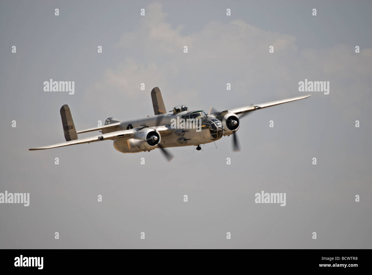 A North American B-25 Mitchell flies at an air show (front 1/4 view ...