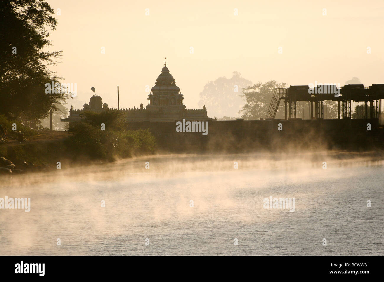 Looking over the steaming water of the Bhadra Reservoir towards the ...