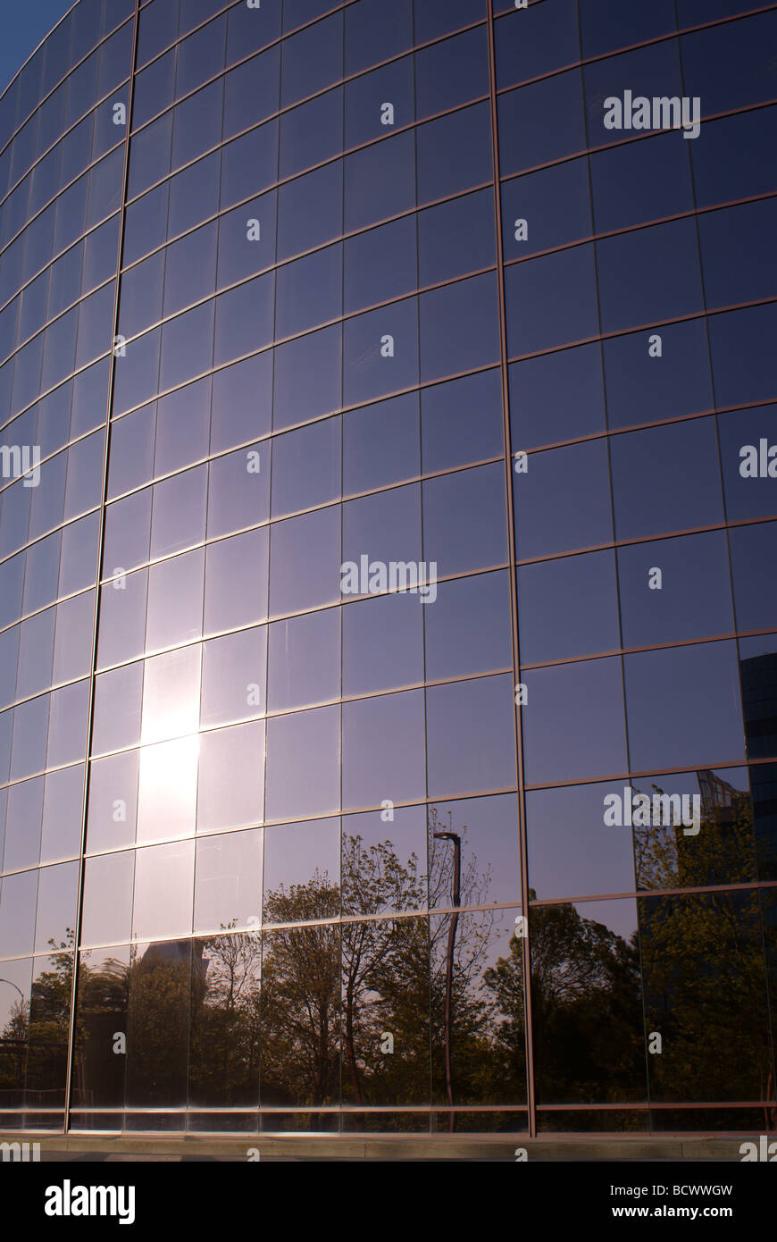 Sun reflected on office building Stock Photo - Alamy