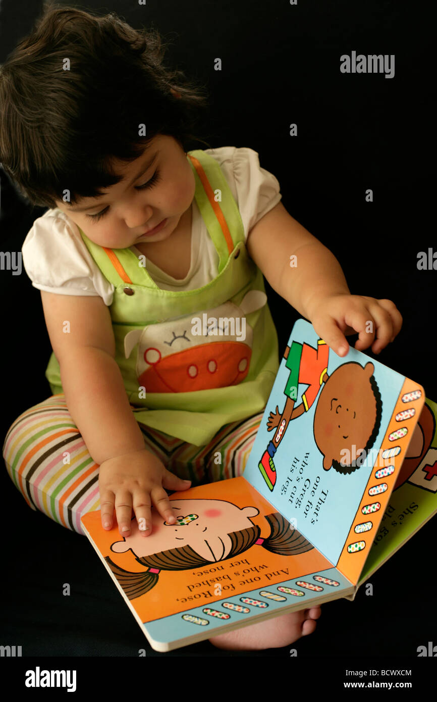 Toddler with books hi-res stock photography and images - Alamy