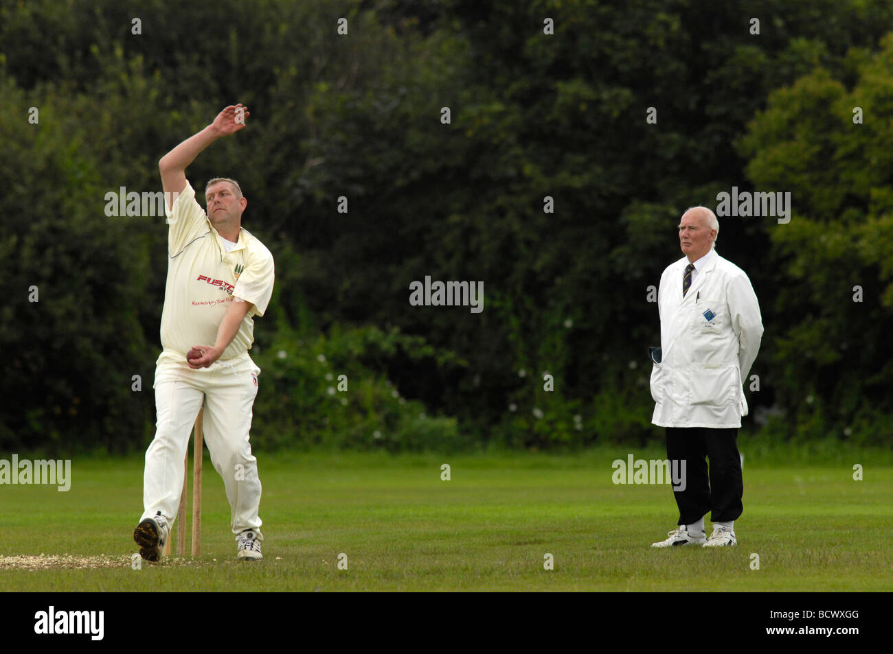 slow left-arm bowler in action Stock Photo - Alamy