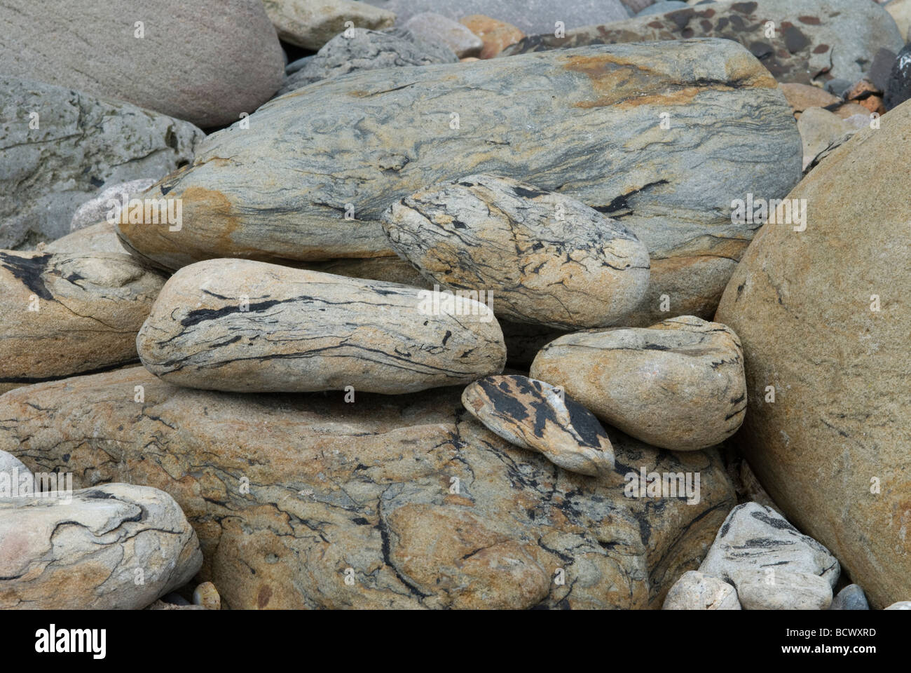 artistic naturally patterned rocks on the sea shore Seahouses ...