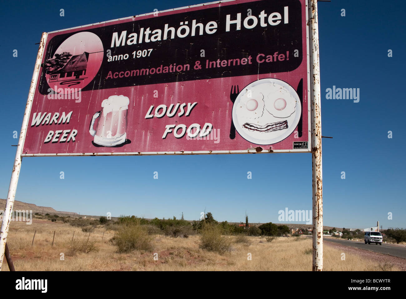 Humorous roadside sign for hotel Maltahohe Namibia Africa Stock Photo ...