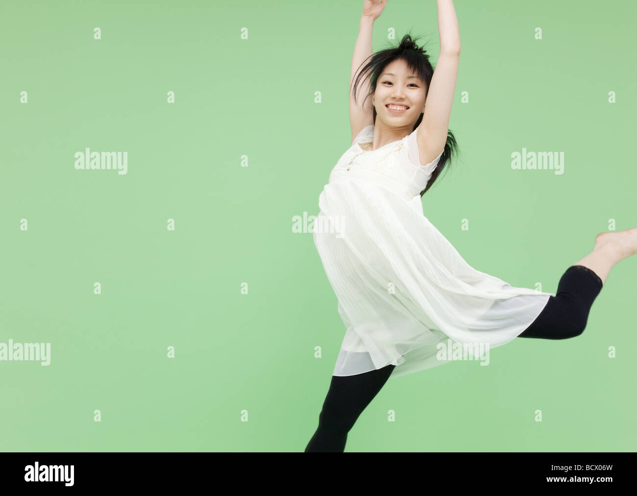 Young woman dancing Stock Photo - Alamy