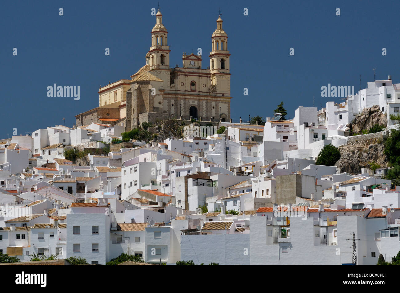 Church above the white village of Olvera Andalusia Spain Stock Photo ...