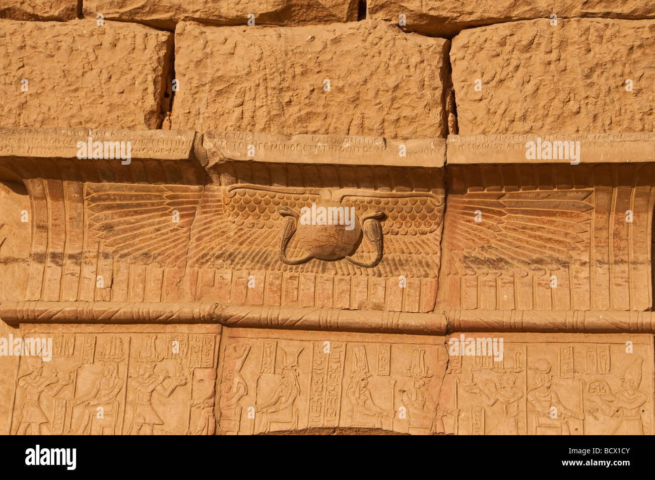 Egypt Kom Ombo temple walls carvings hieroglyphs winged solar disk ...