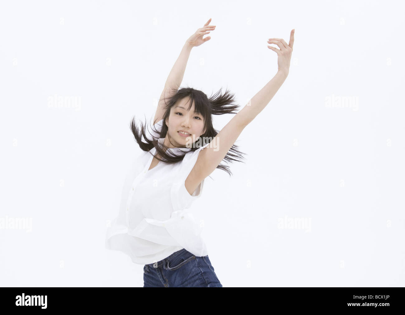 Young woman dancing Stock Photo - Alamy