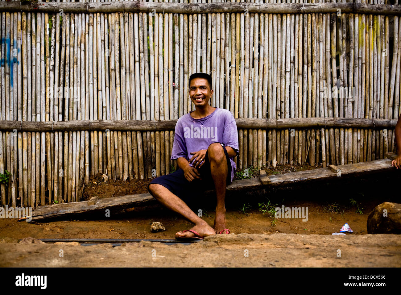 A man sits for a portrait in Coron Town in the Philippines Stock Photo ...