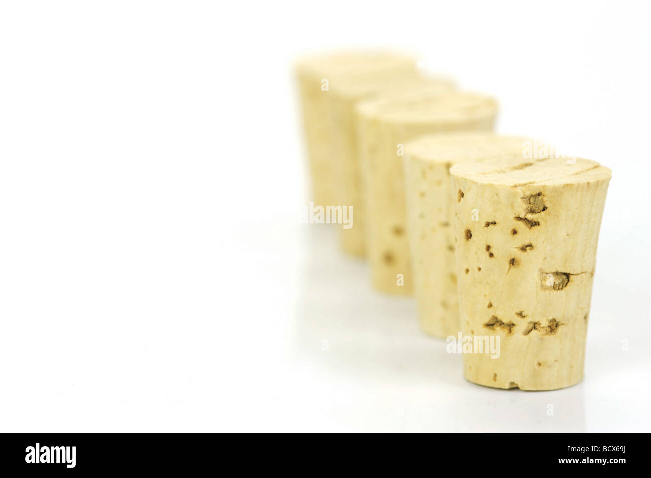 Cork stoppers isolated against a white background Stock Photo - Alamy