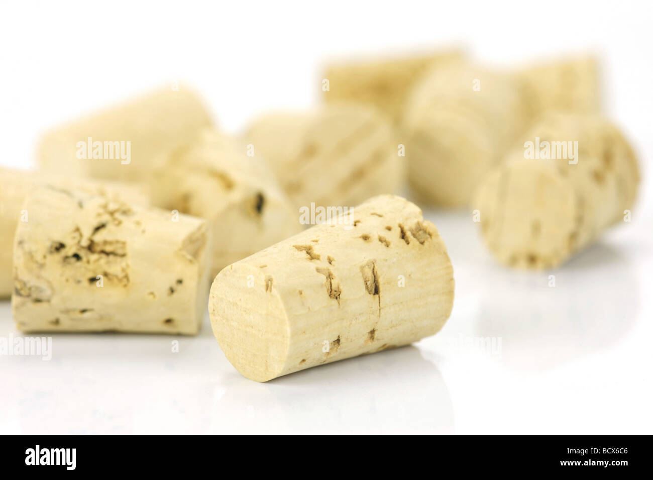 Cork stoppers isolated against a white background Stock Photo - Alamy