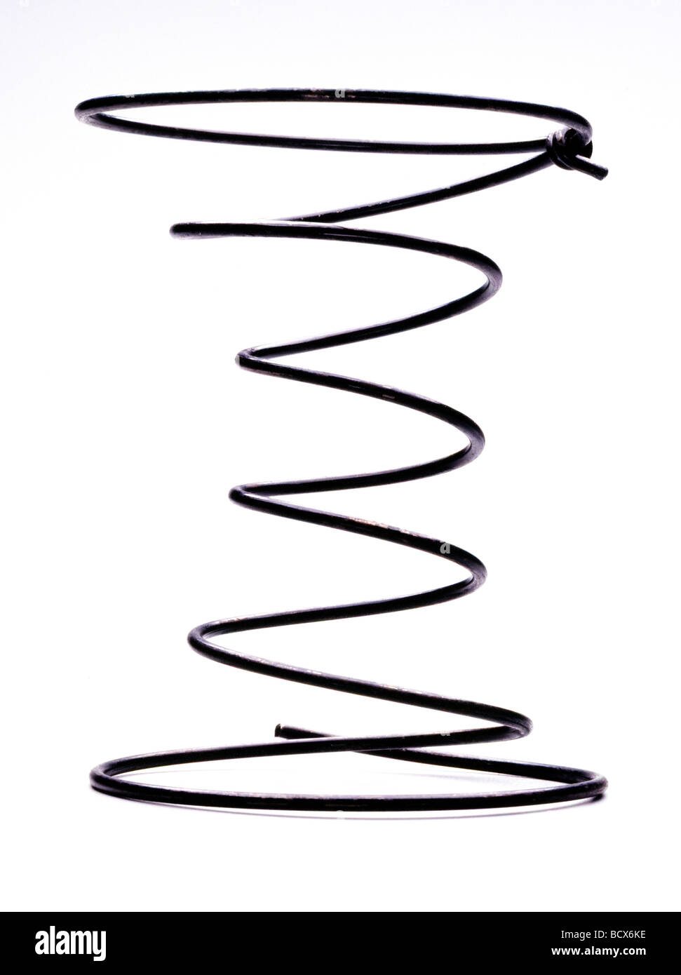 A steel bedspring on a white background Stock Photo - Alamy