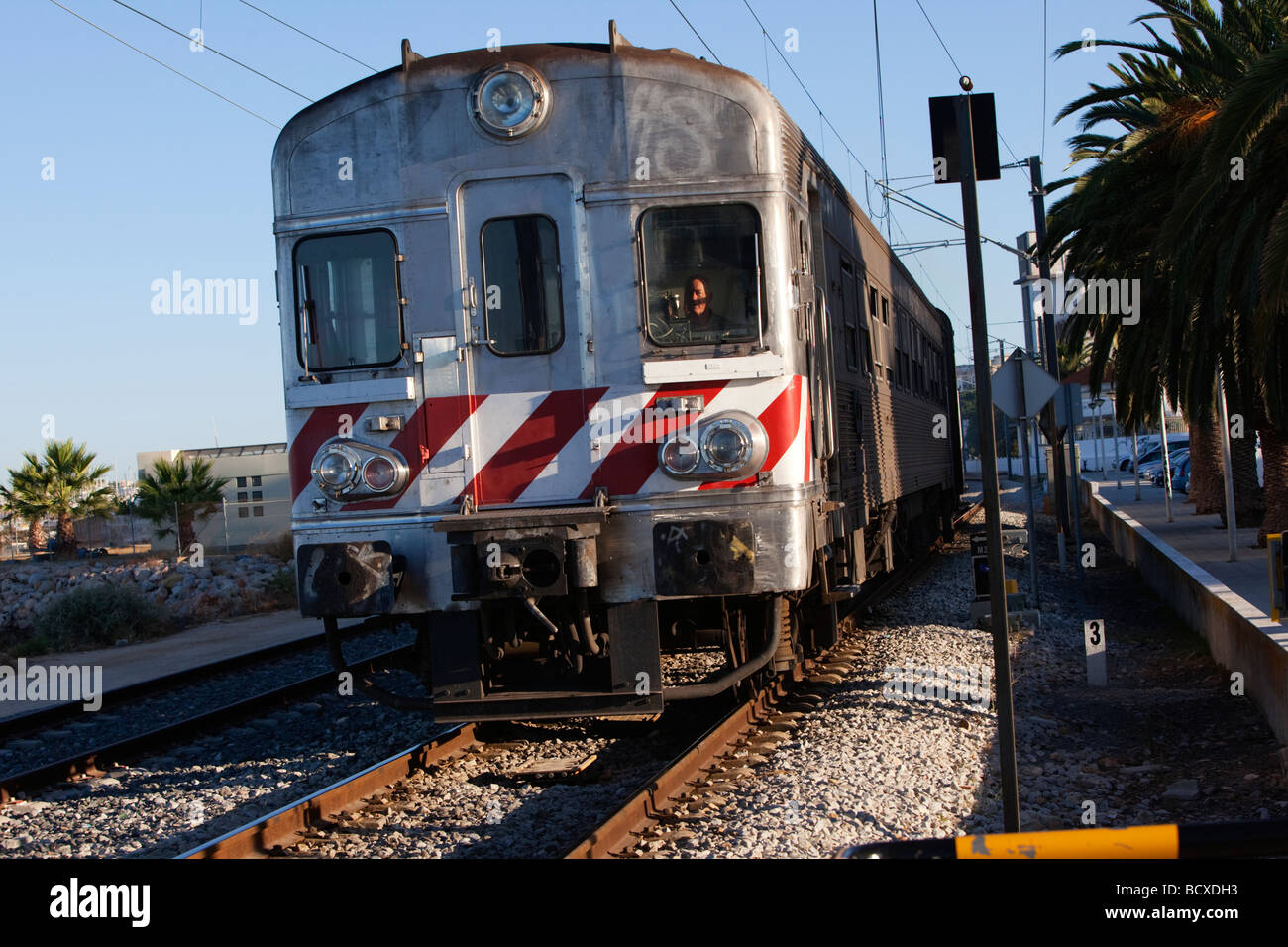 Diesel engine train running on the Algarve train line, Linha do Algarve ...