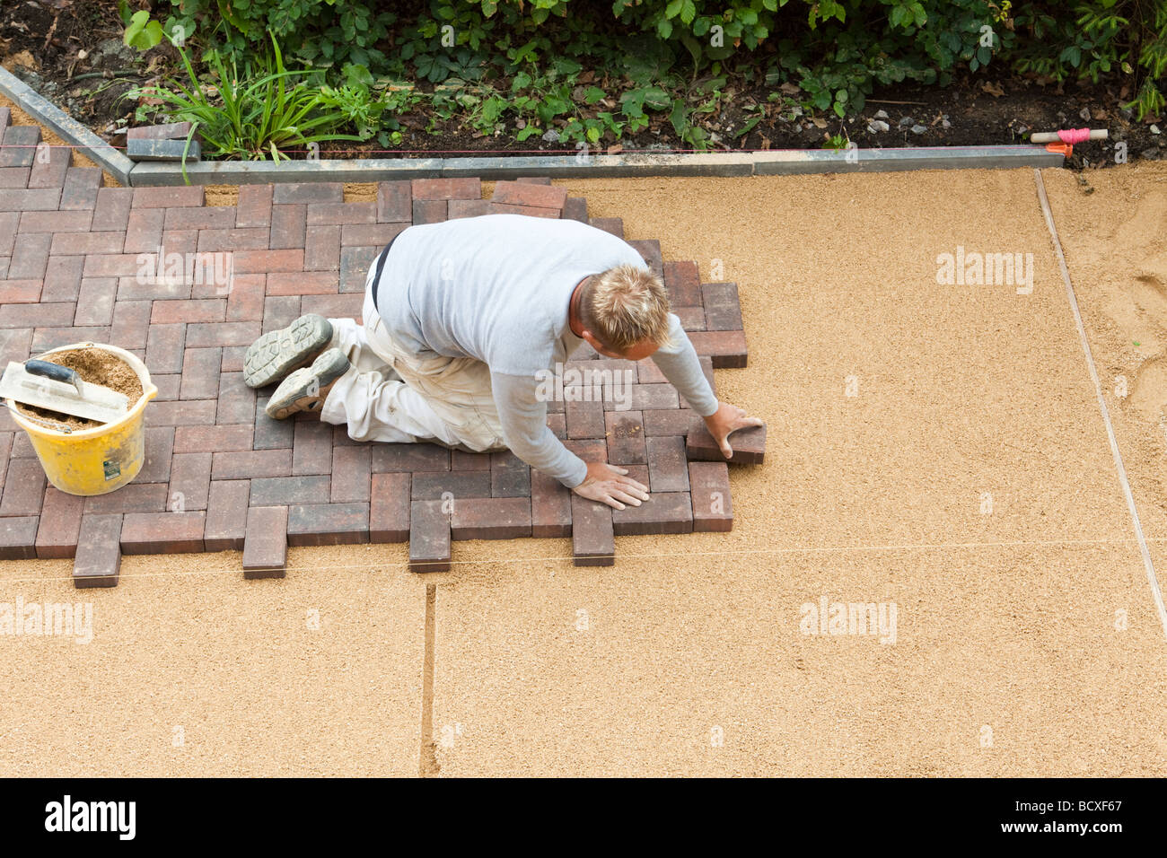 Block paving a domestic drive Stock Photo - Alamy