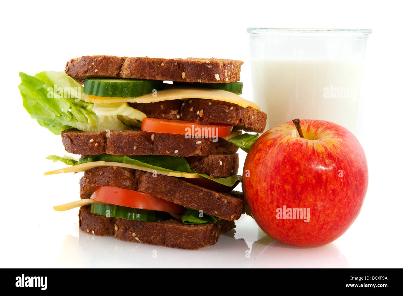 Healthy lunch with whole meal bread cheese fruit and milk Stock Photo ...