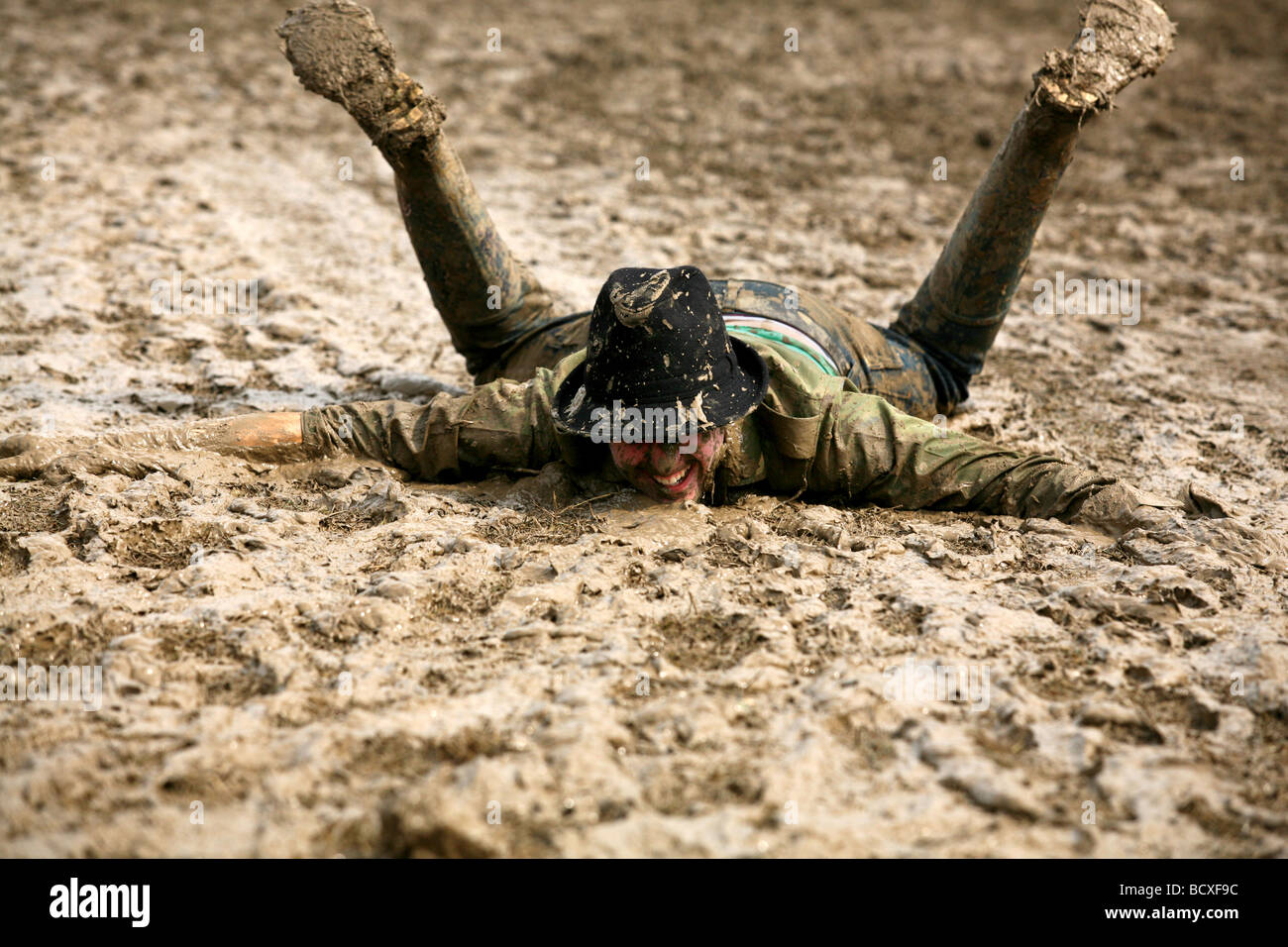 Fun in the mud at Glastonbury 2009 Stock Photo - Alamy