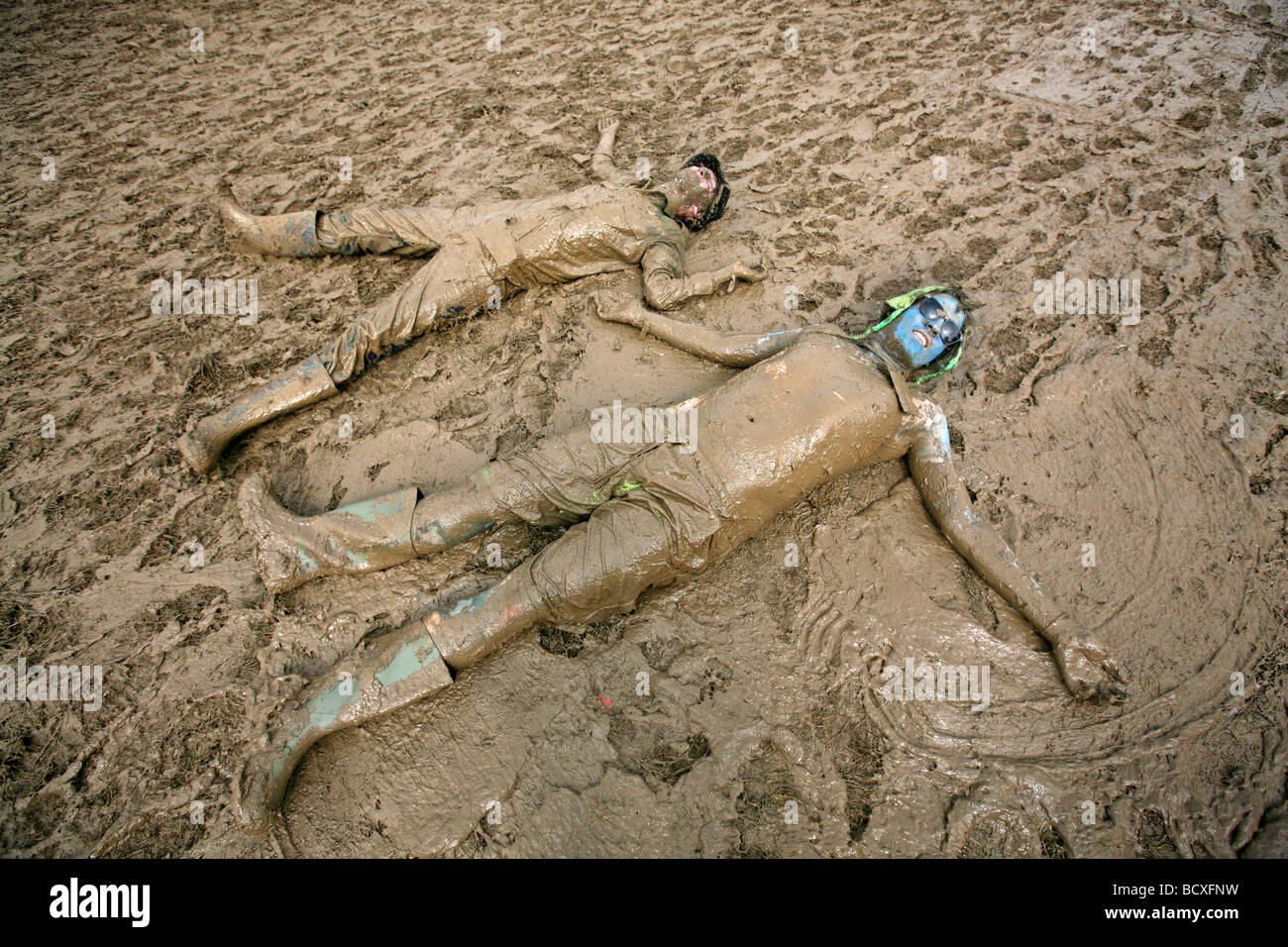 Covered in mud glastonbury hi-res stock photography and images - Alamy