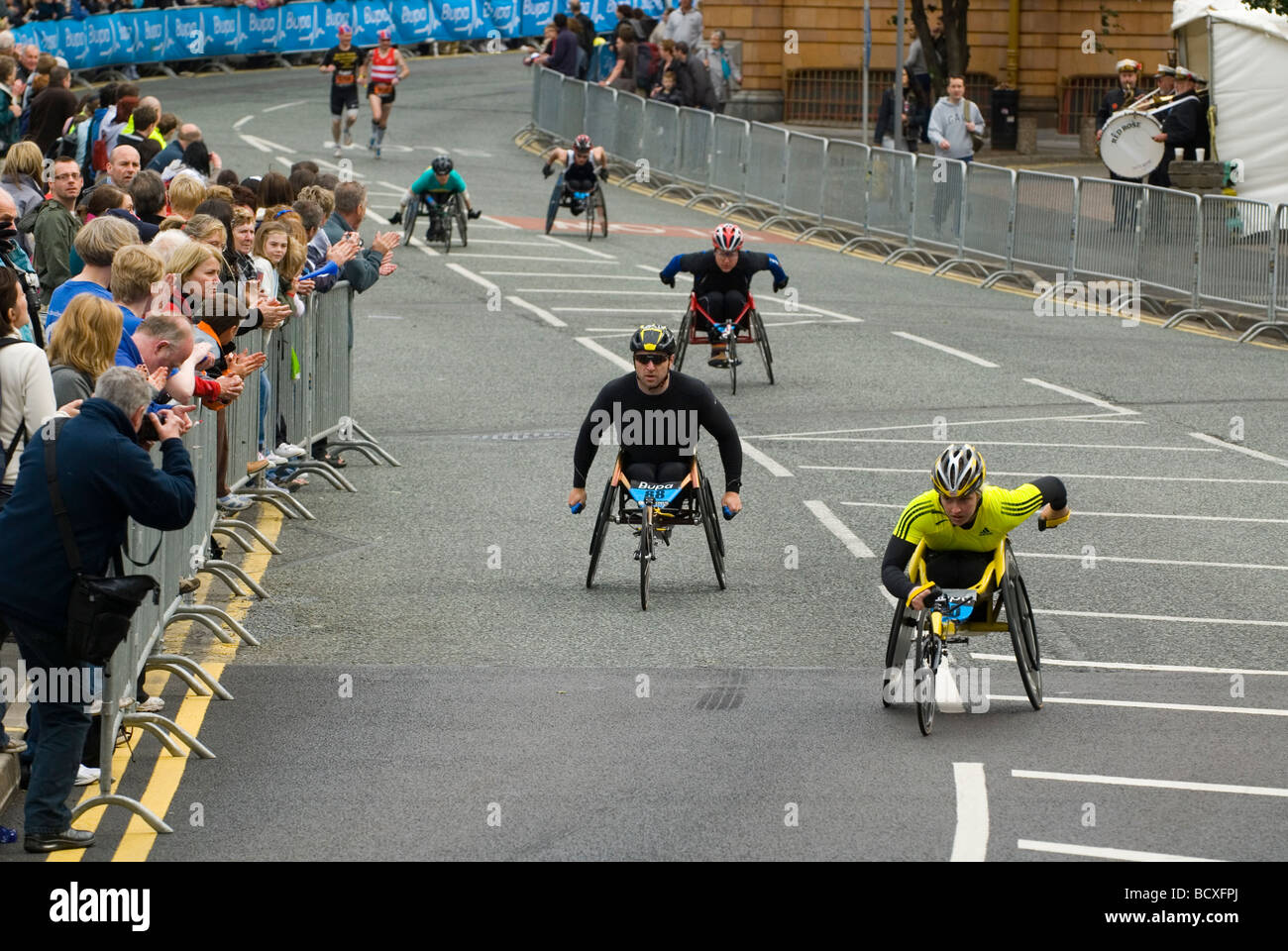 Disabled athletes racing in a marathon Manchester UK Stock Photo - Alamy