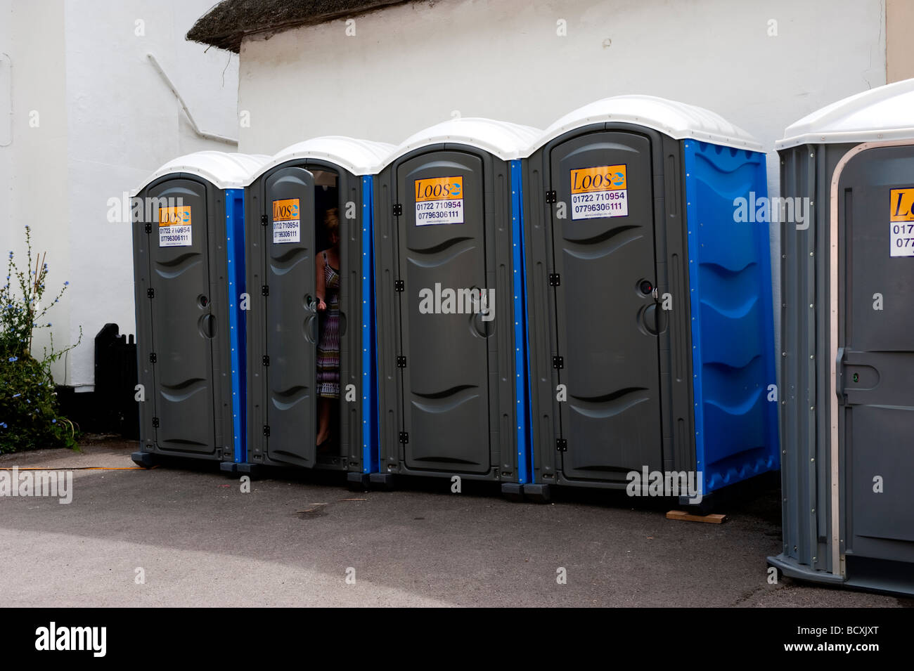 Row public toilets hi-res stock photography and images - Alamy
