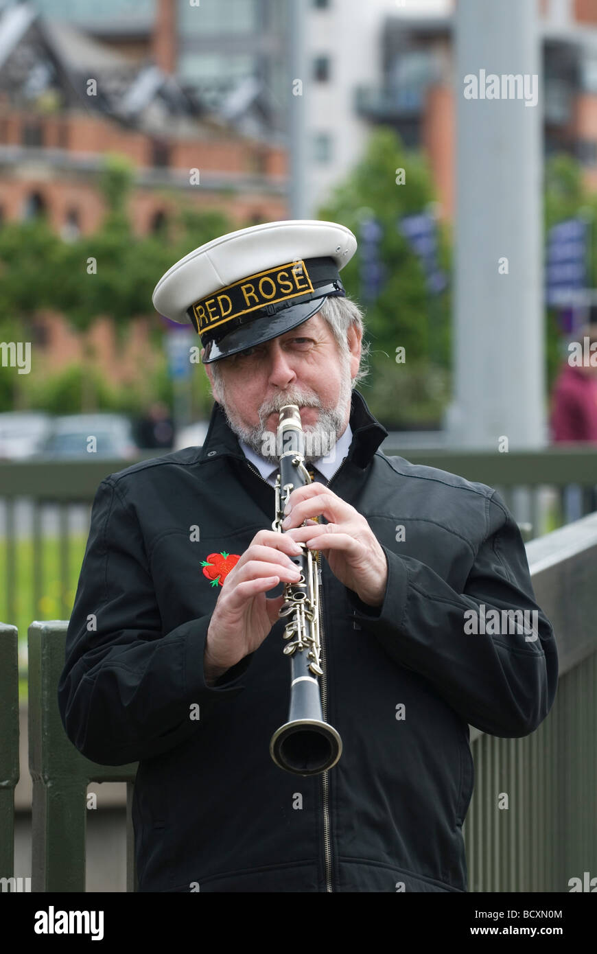 Red Rose band member playing the clarinet Manchester UK Stock Photo - Alamy
