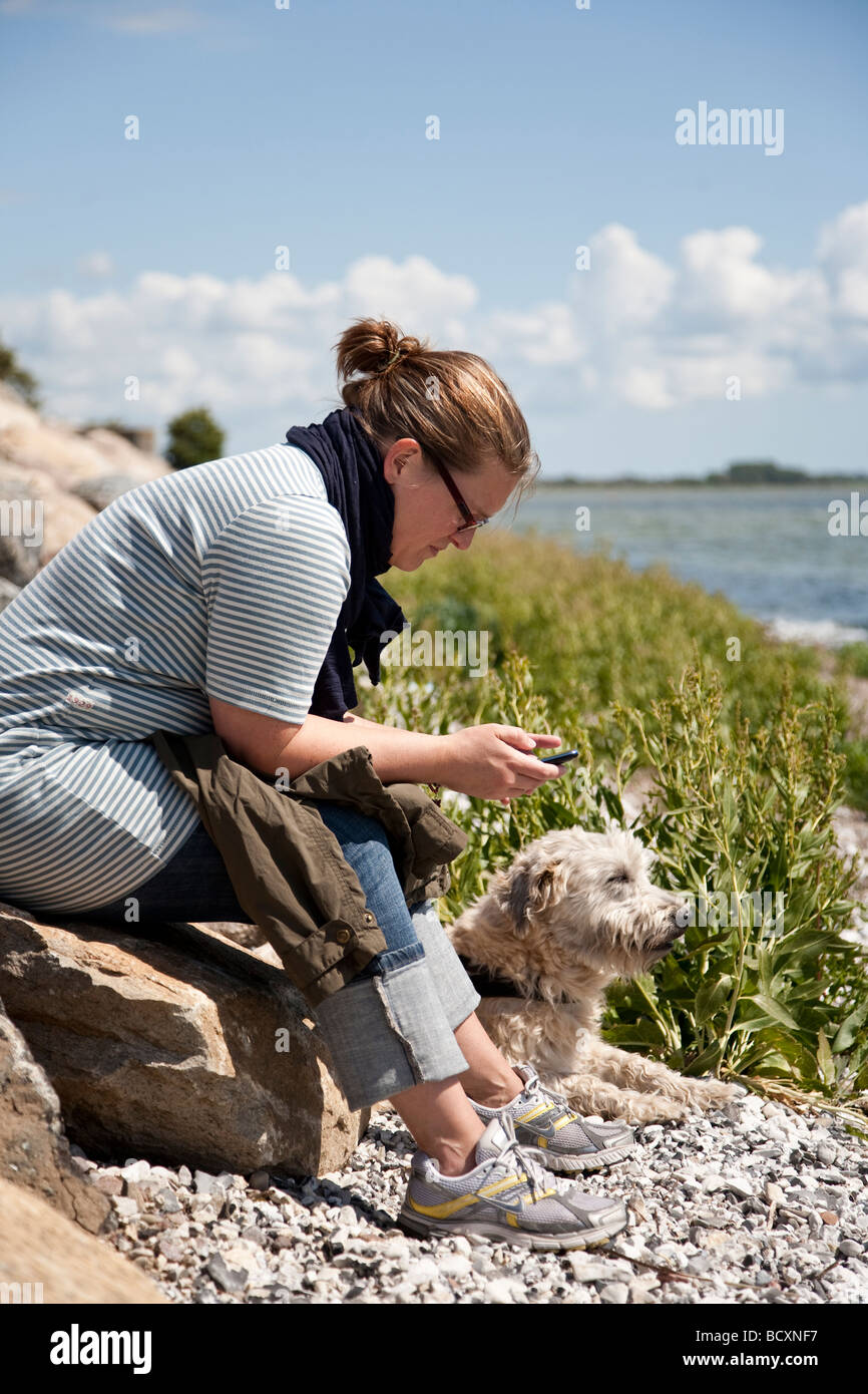 Adult female sitting writing hi-res stock photography and images - Alamy