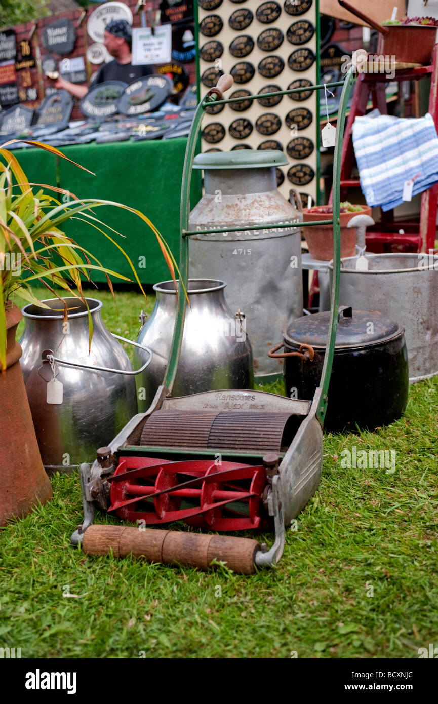 Old fashioned hand lawn mower on display Stock Photo - Alamy