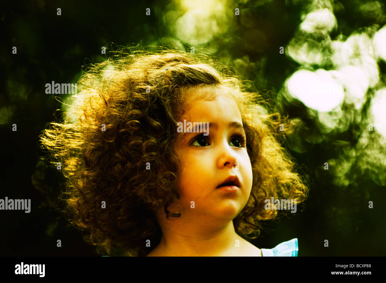 Frightened little girl outdoors Stock Photo - Alamy