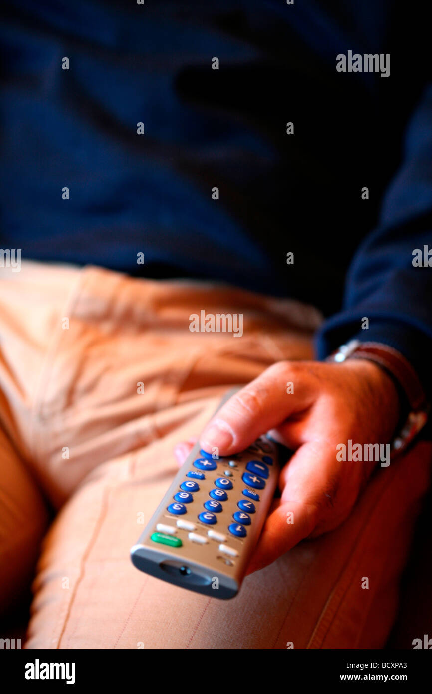 man with remote control Stock Photo - Alamy