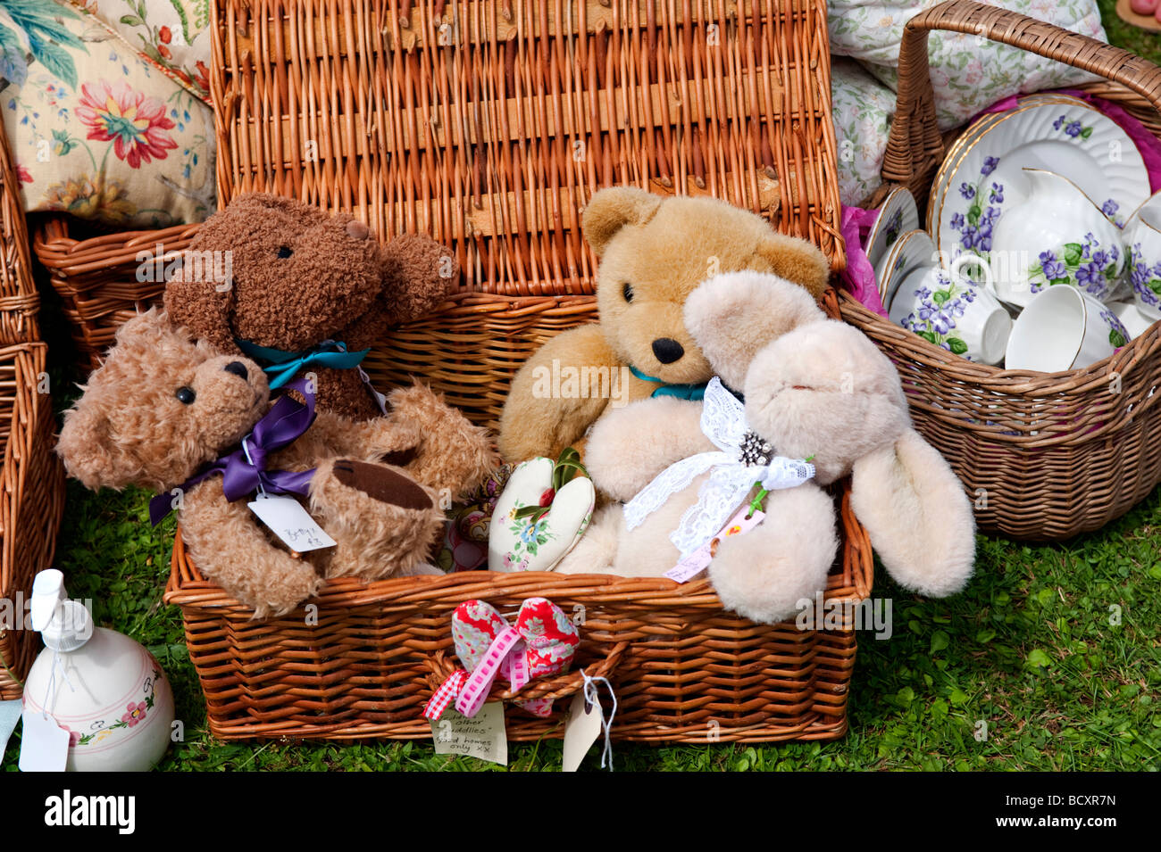 Soft toys in a wicker basket Stock Photo - Alamy