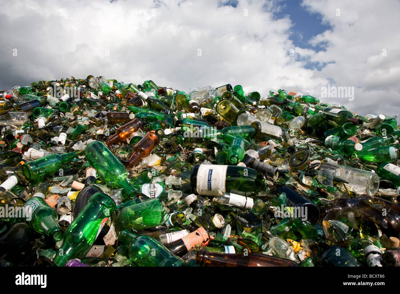 Bottles broken in public recycling materials Stock Photo - Alamy