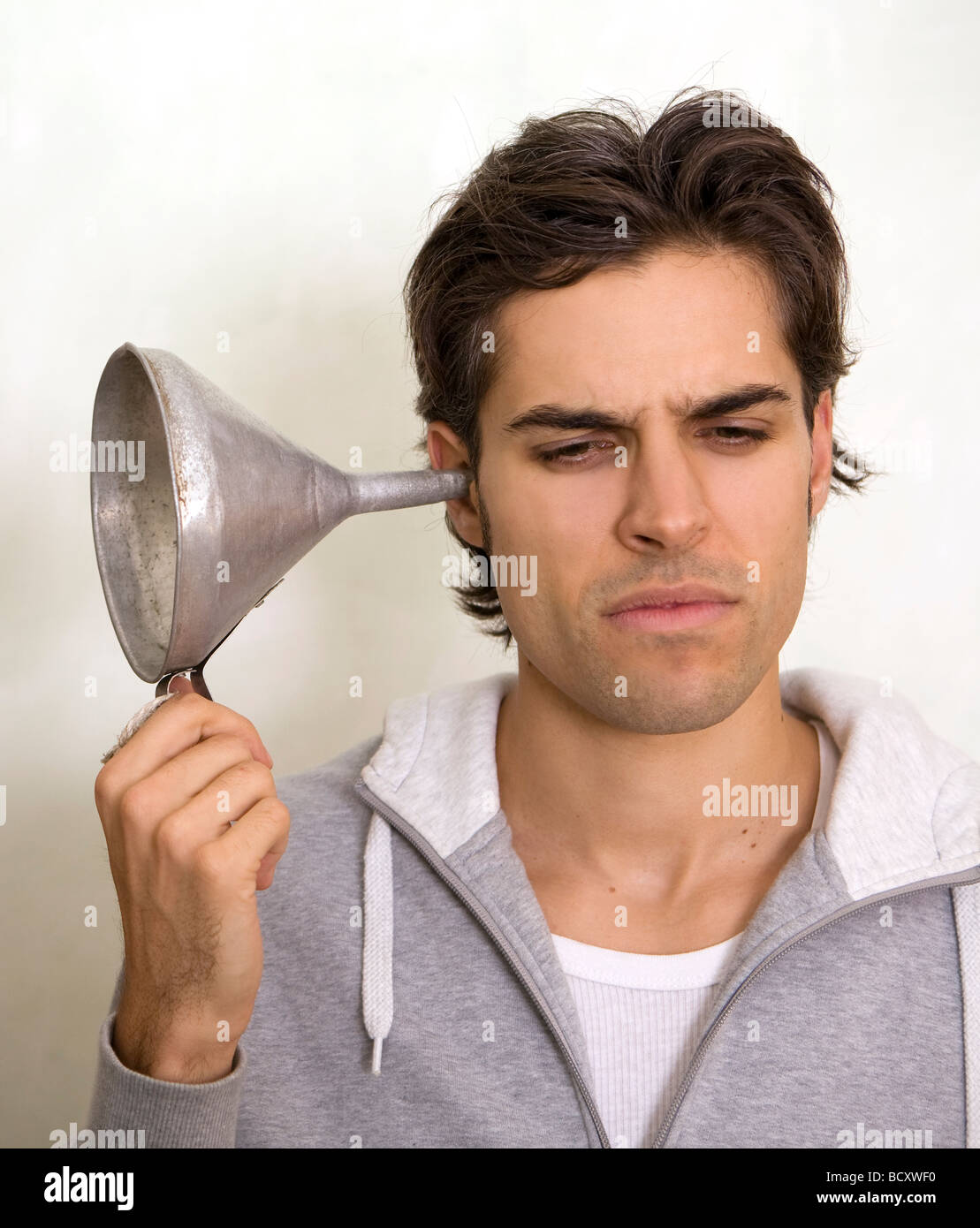 man with funnel Stock Photo - Alamy