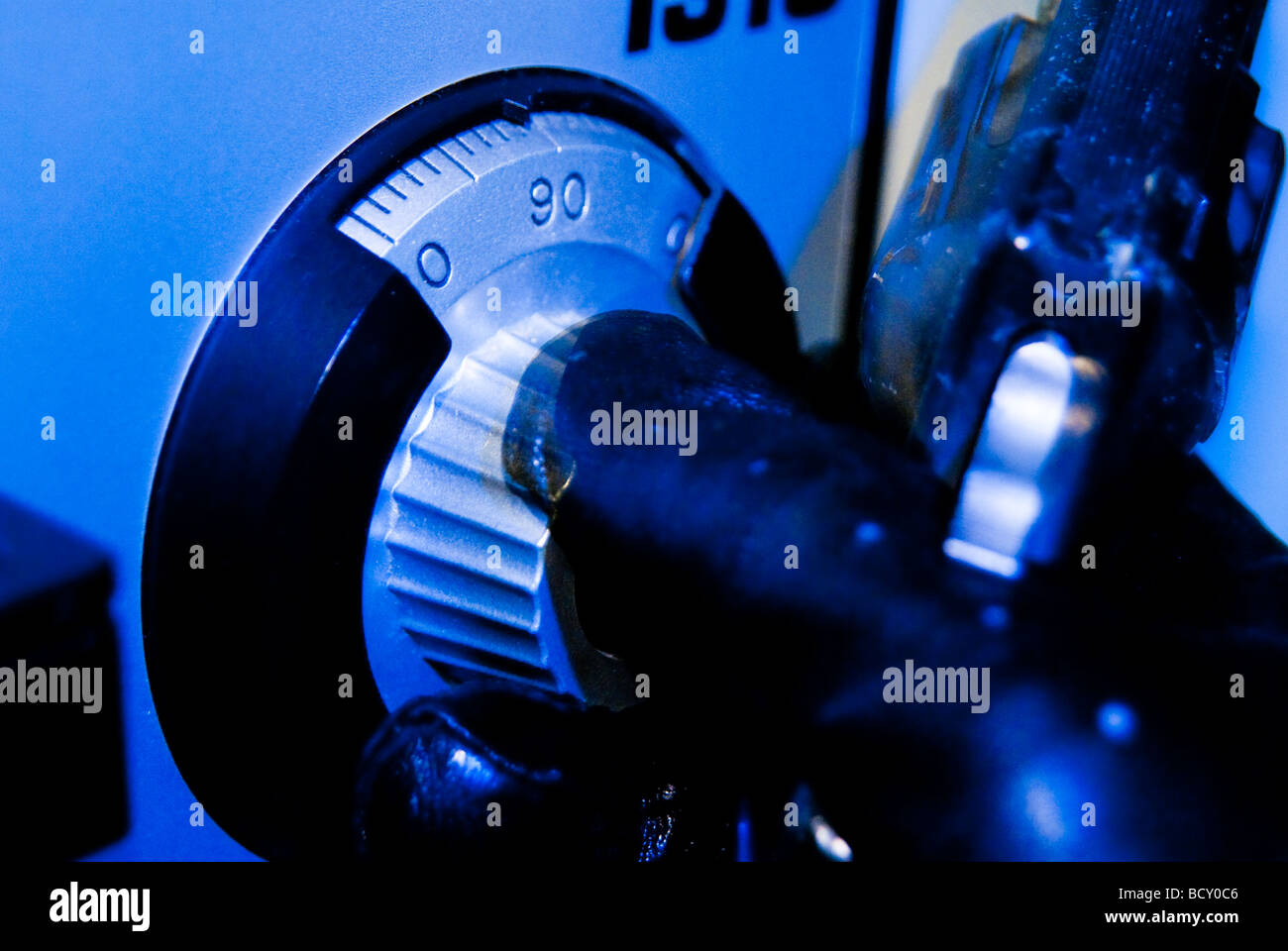 Burglar cracking a safe Stock Photo - Alamy Burglar cracking a safe Stock Photo - Alamy
