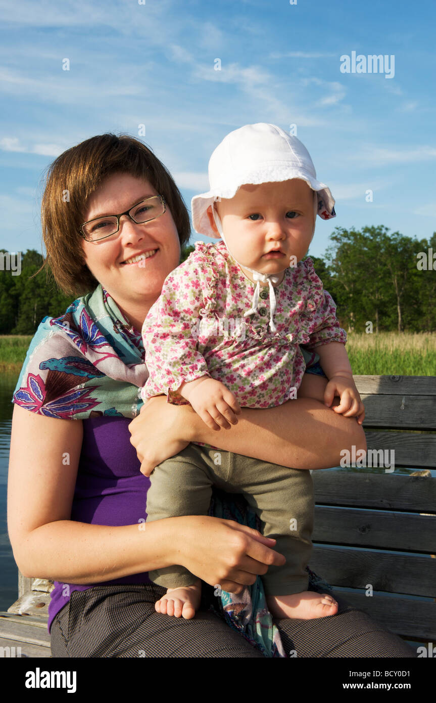 mother and daughter outside baby Stock Photo - Alamy