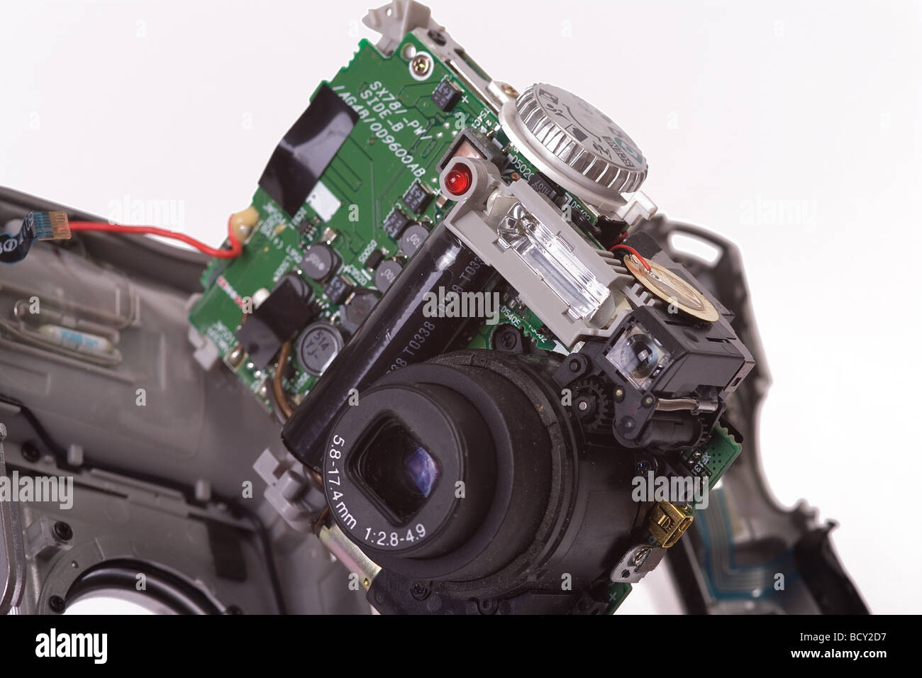broken digital camera on white background Stock Photo - Alamy
