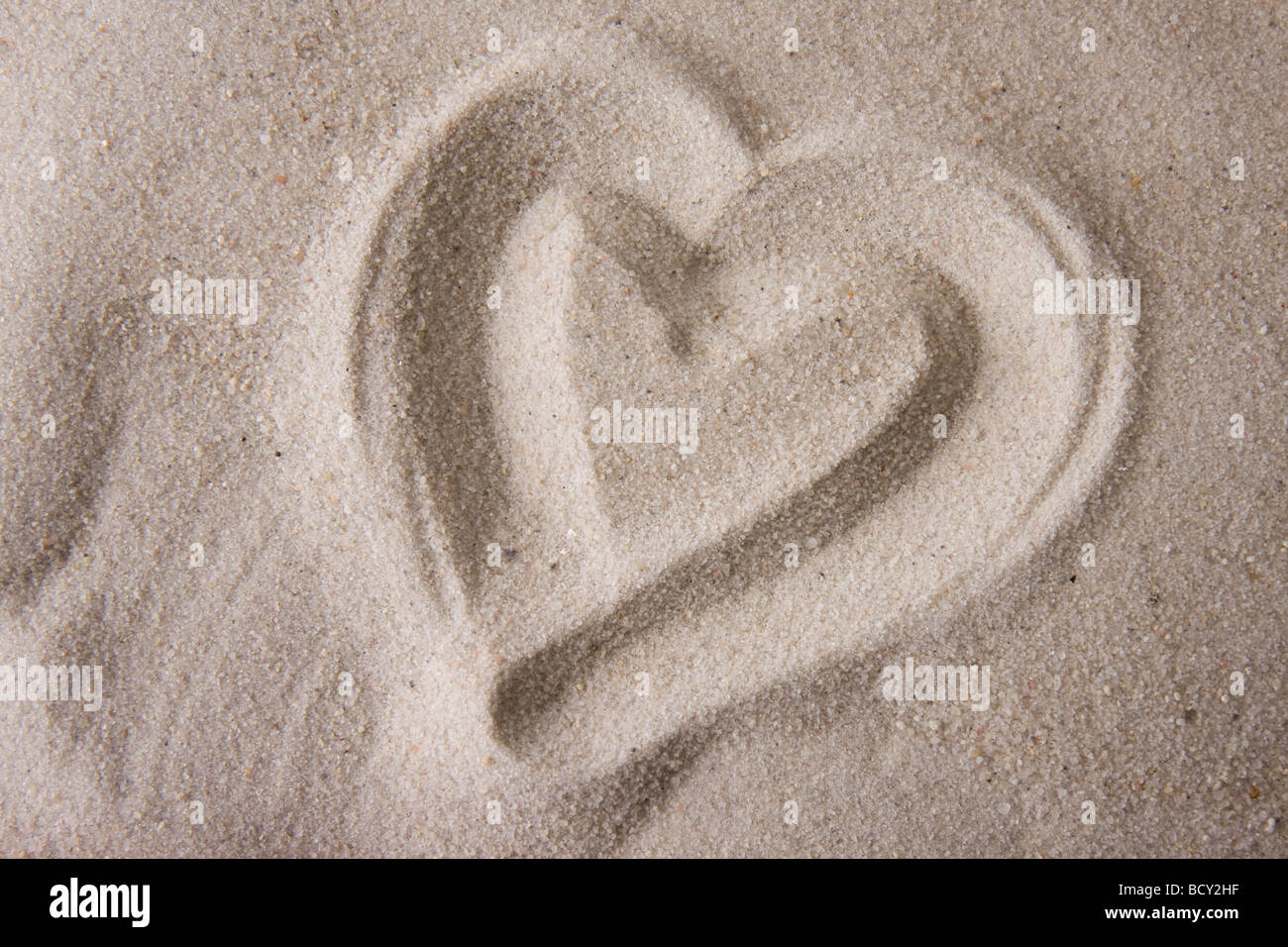the heart in a sand Stock Photo - Alamy