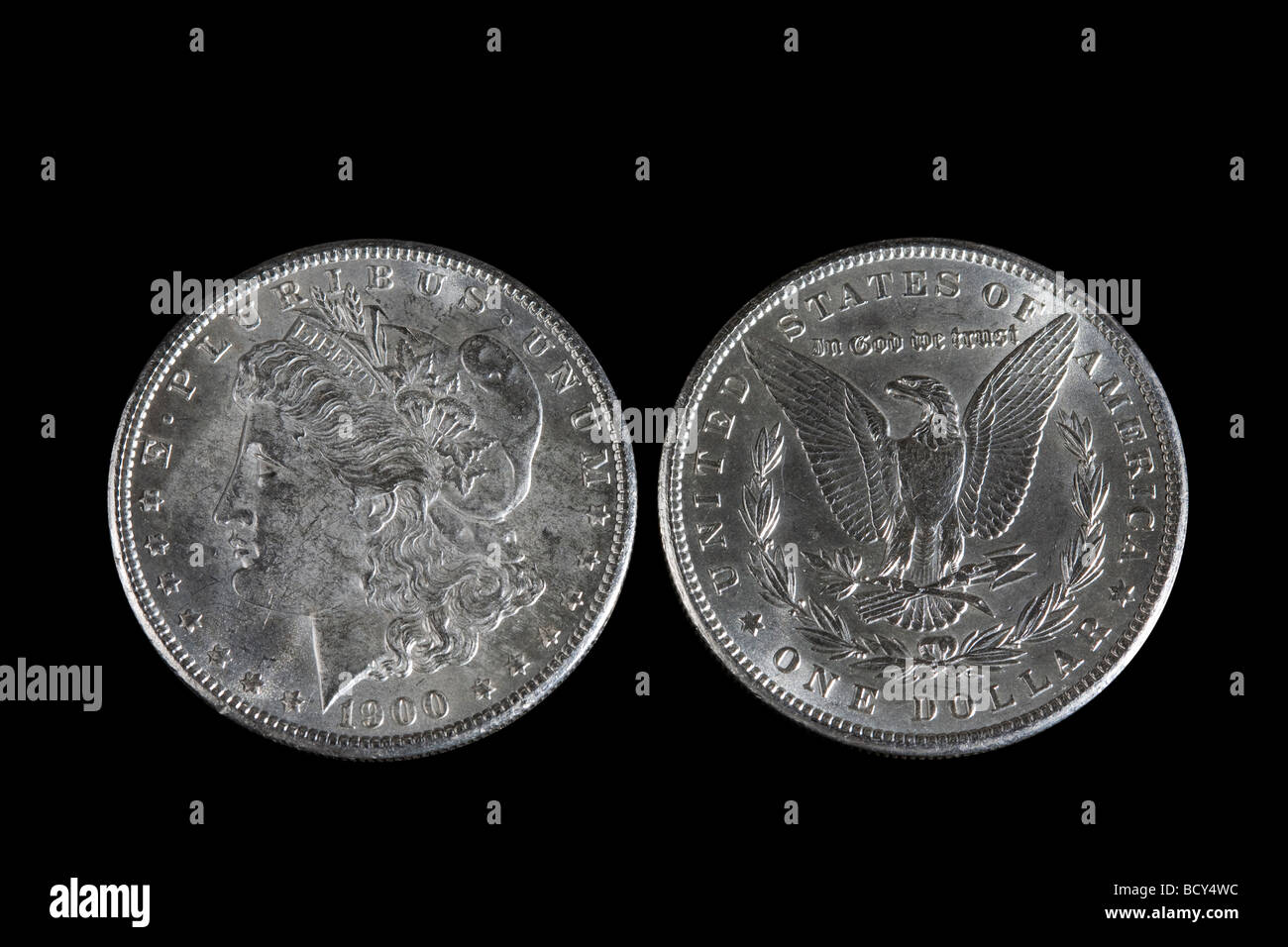 Front and back of a Morgan Silver Dollar against black background Stock ...